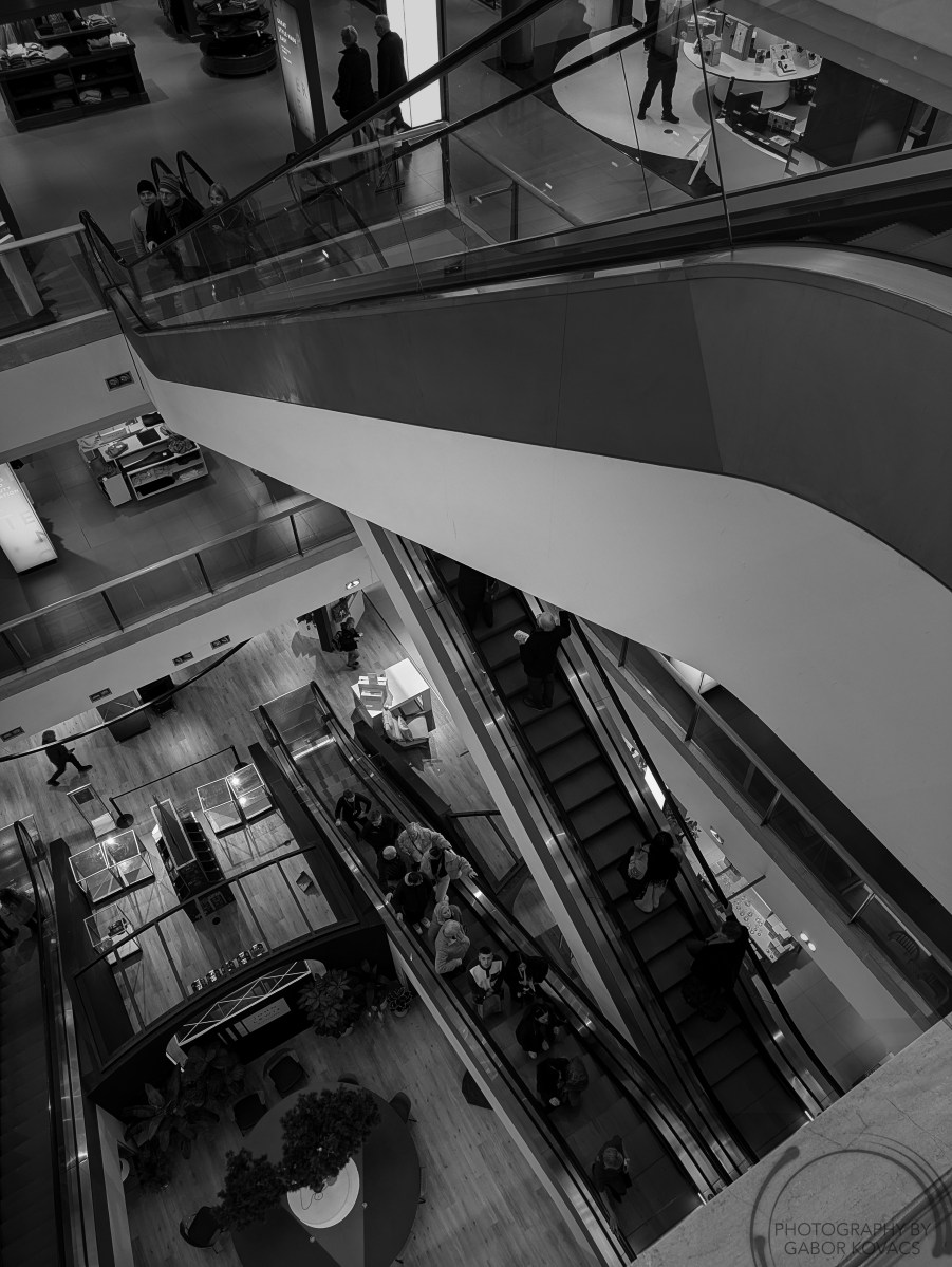 Escalators in the department store – photography by Gabor Kovacs